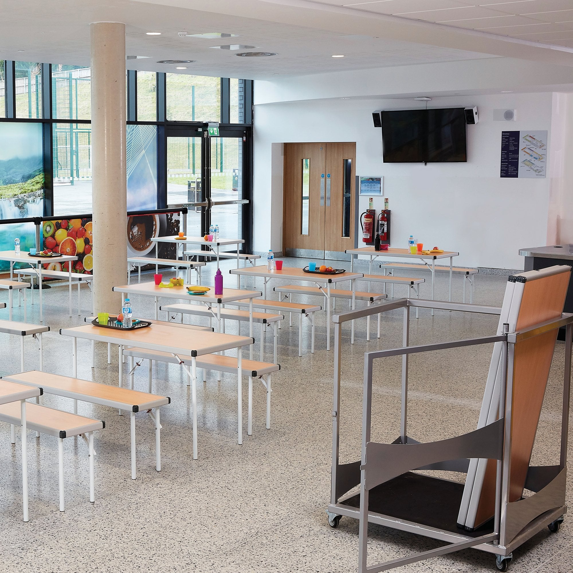 20 Fast Fold Tables With Storage Trolley Oak | Eduspace Supplies
